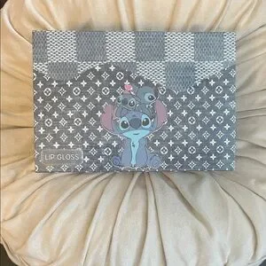 Makeup | Lip Gloss Vault Featuring Stitch With A Beautiful Designer ...